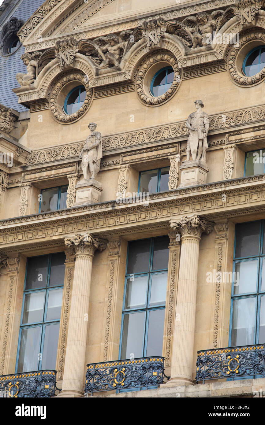 Intricate carving and statues on the buildings of Paris, France near ...