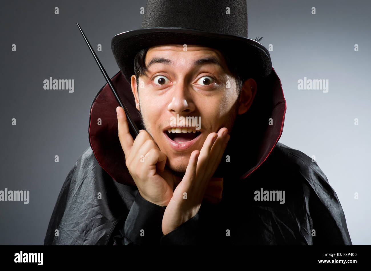 Funny magician man with wand and hat Stock Photo - Alamy