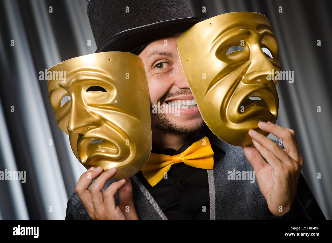 Funny concept with theatrical mask Stock Photo - Alamy
