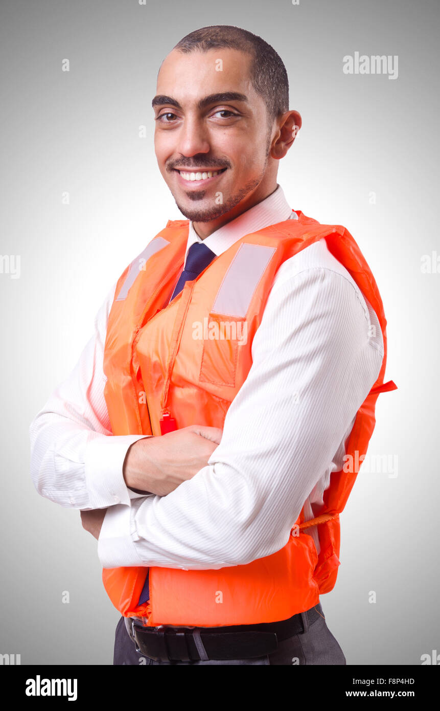 Man in life jacket isolated on white Stock Photo - Alamy