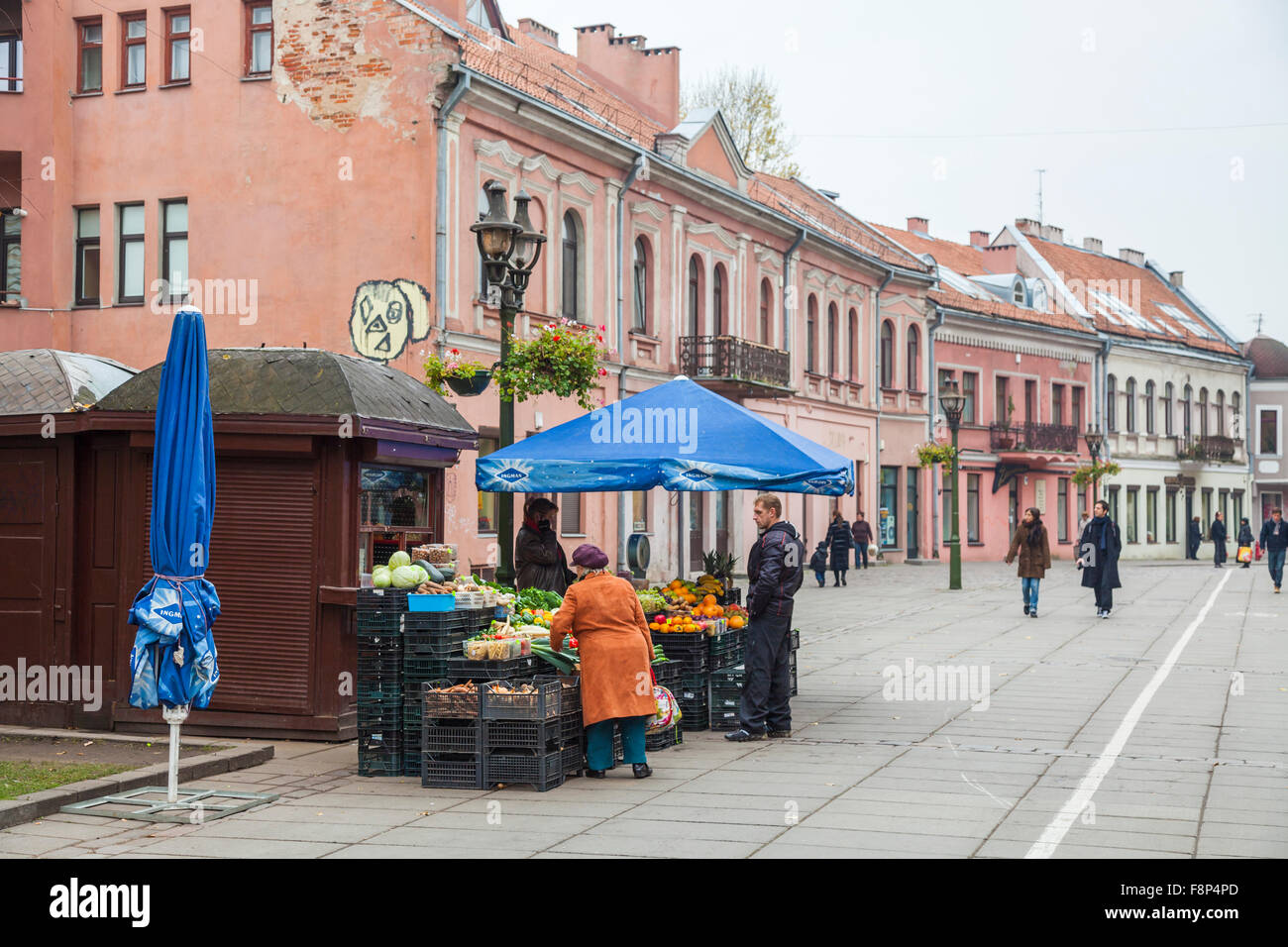 Roadside pavement stall selling fruit and vegetables to local people in ...