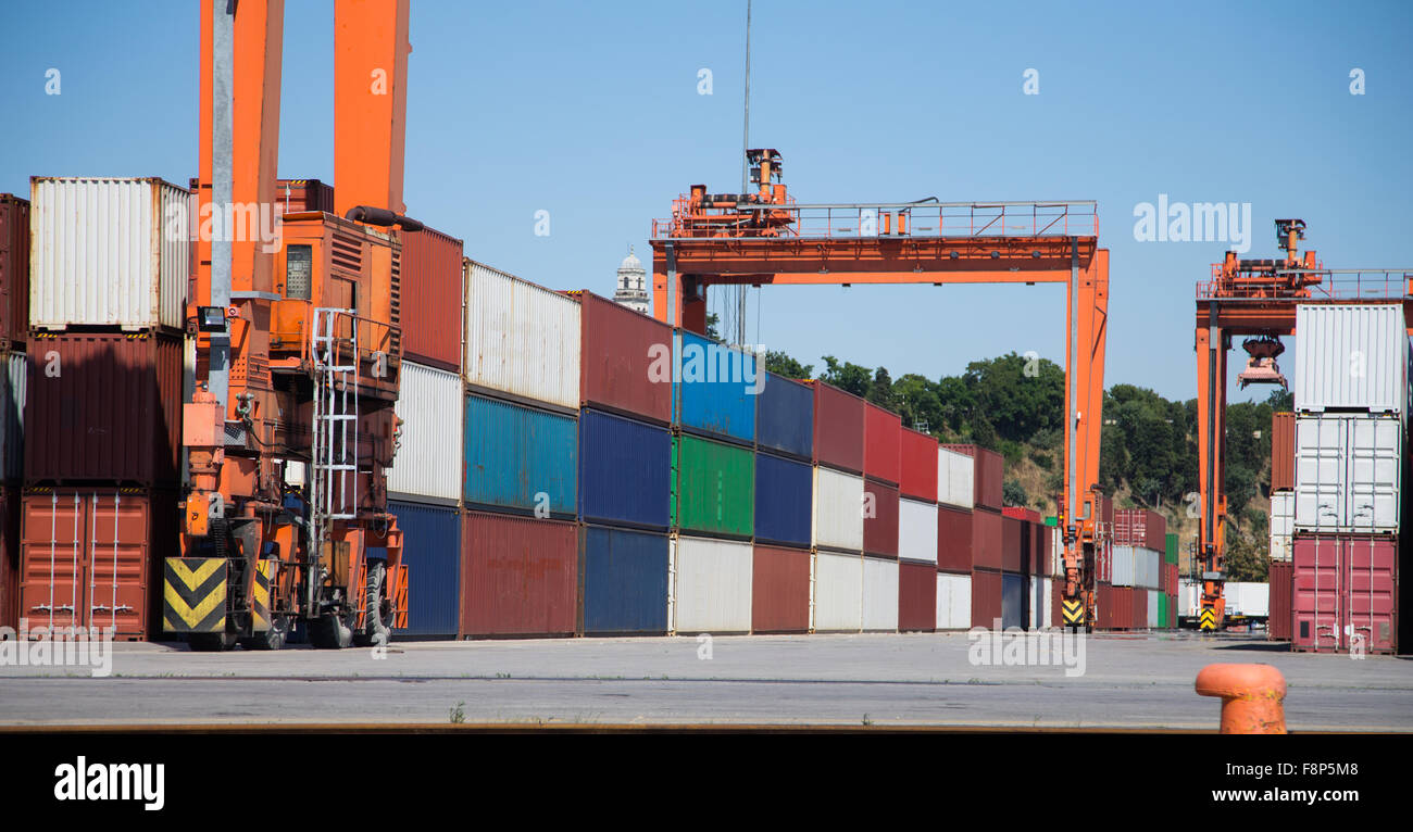 Containers waiting to transfer in a port Stock Photo - Alamy