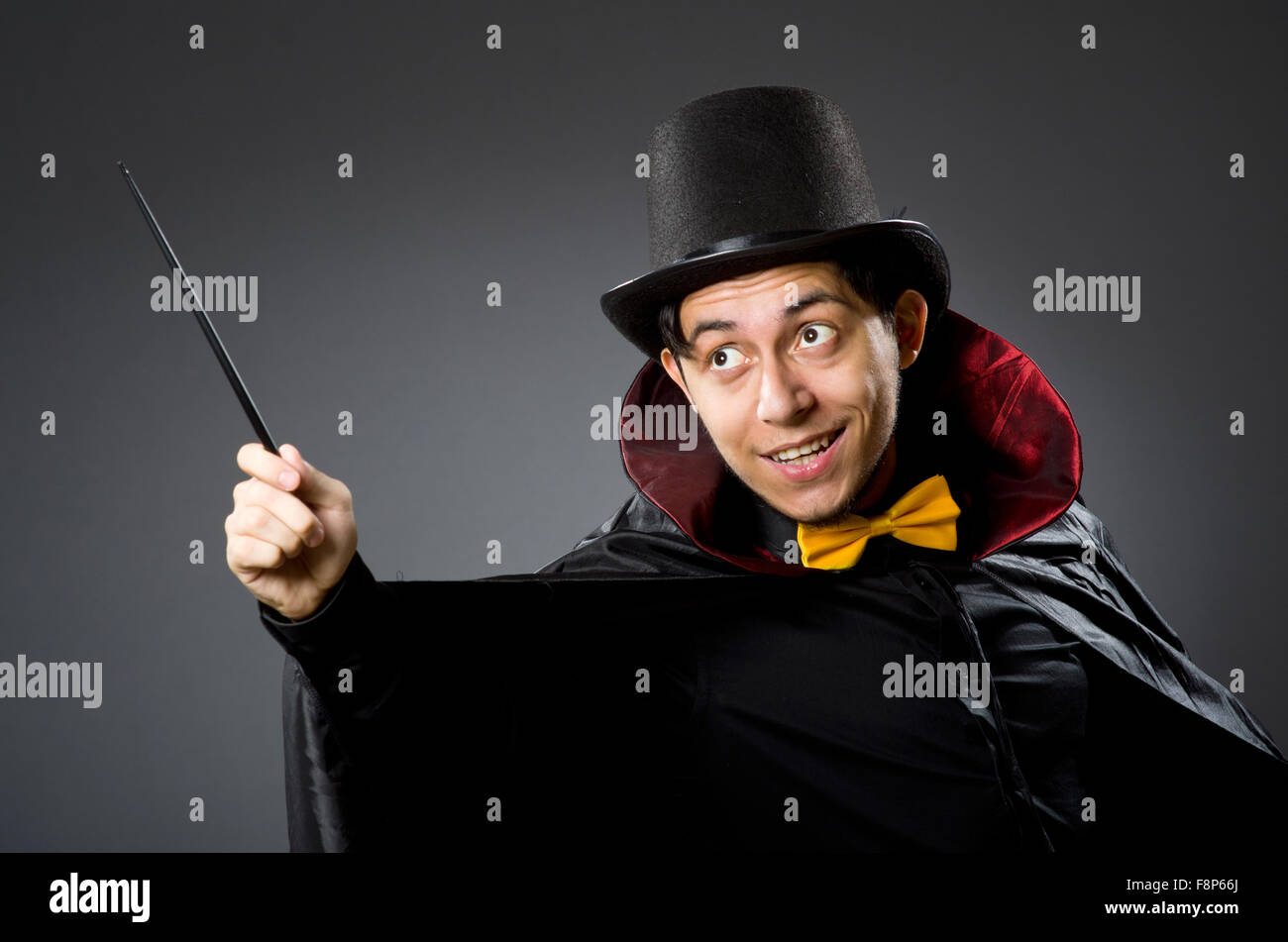 Funny magician man with wand and hat Stock Photo - Alamy