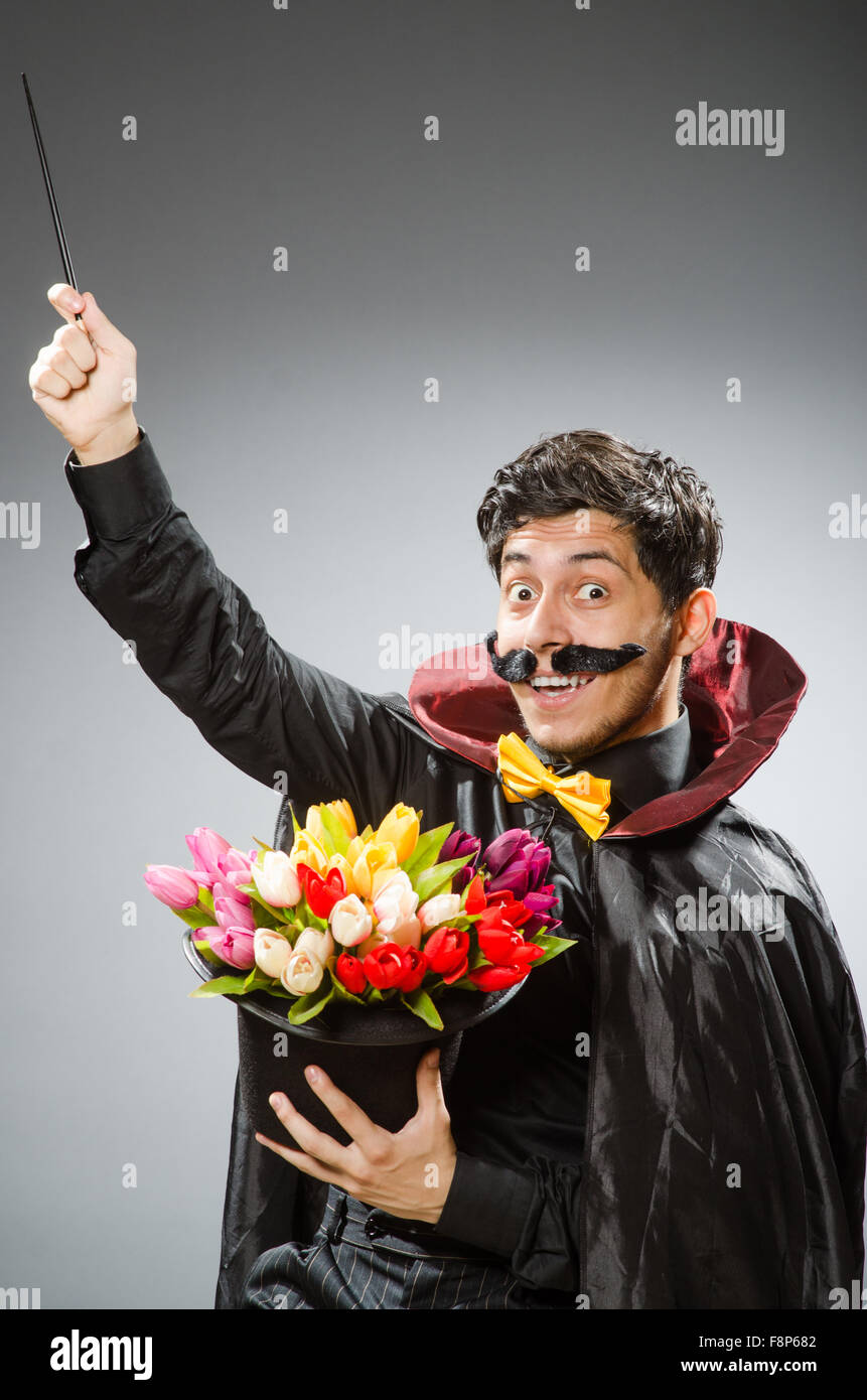 Funny magician man with wand and hat Stock Photo - Alamy