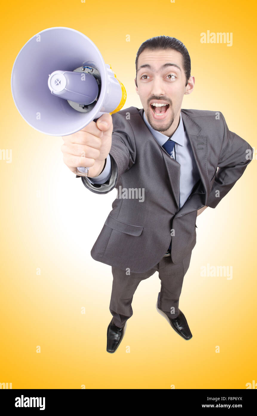 Man shouting and yelling with loudspeaker Stock Photo - Alamy