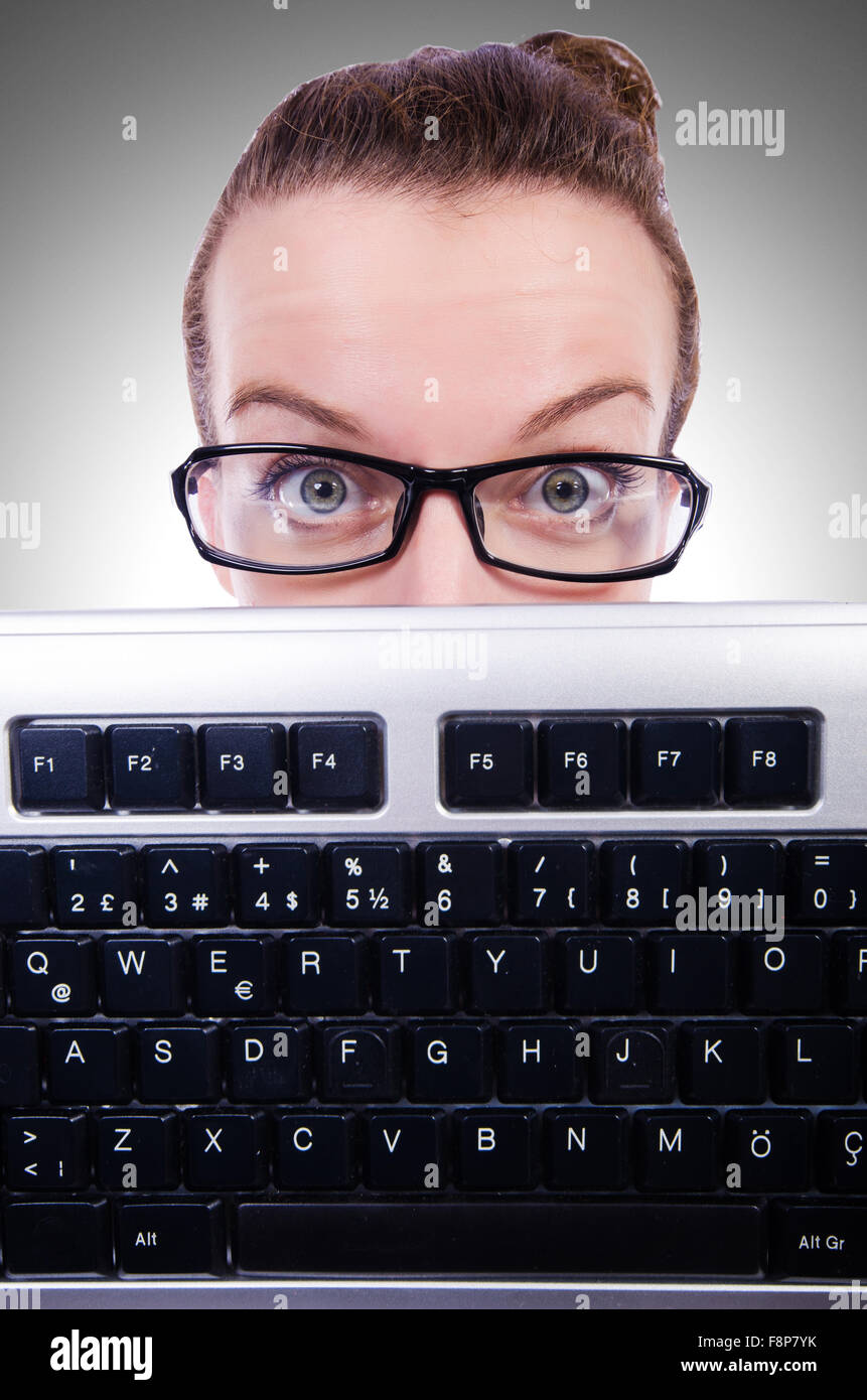 Nerd businessman with computer keyboard on white Stock Photo - Alamy