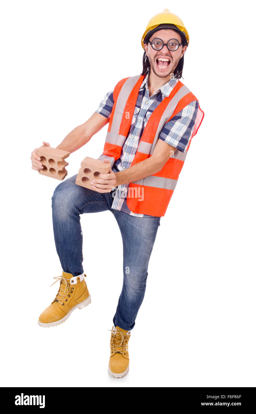 Funny young construction worker with broken brick isolated on white ...