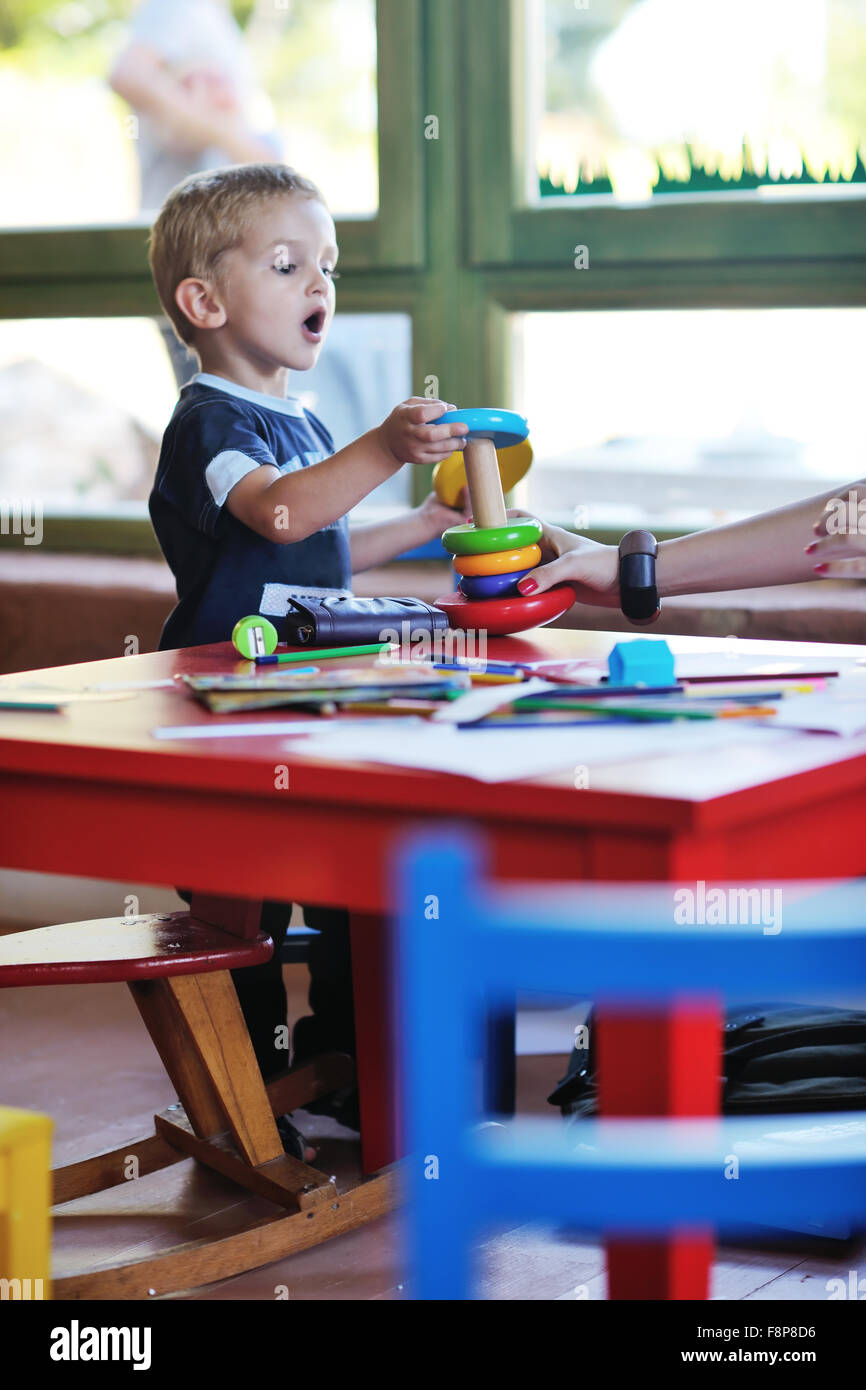 happy little child play game and have fun, education lessons in ...