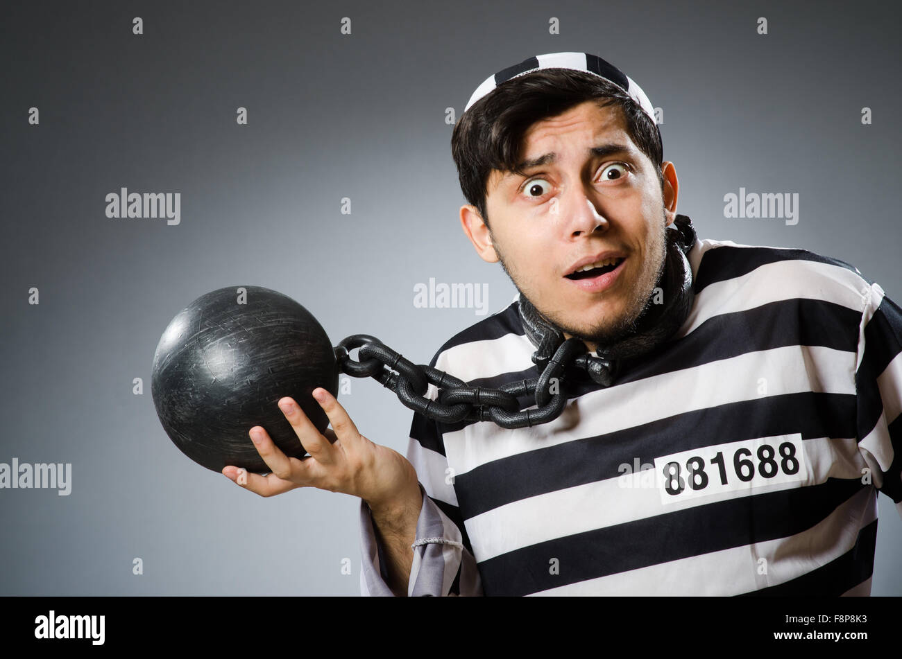 Prison inmate in funny concept Stock Photo - Alamy