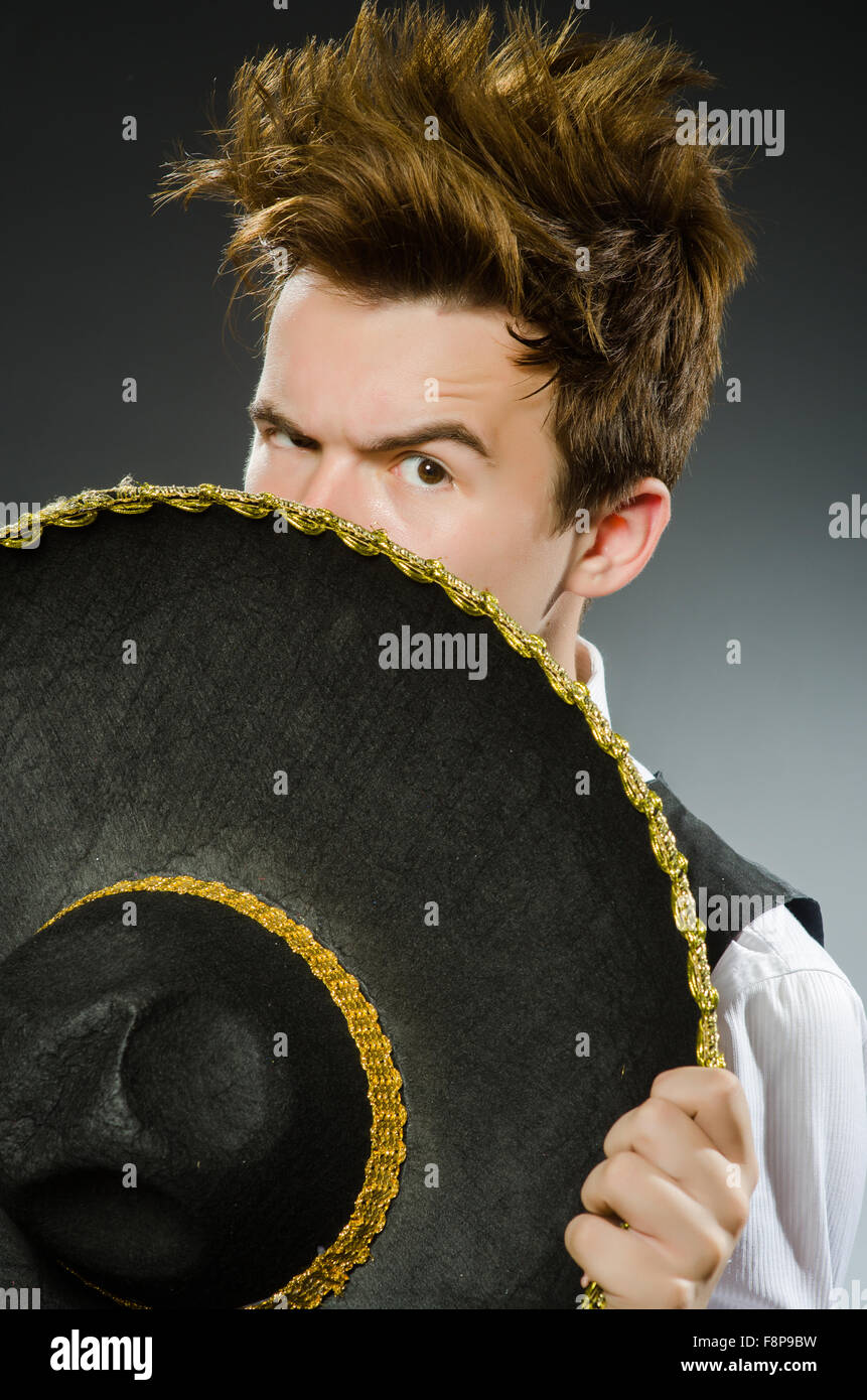 Smiling mexican with sombrero isolated on white Stock Photo - Alamy