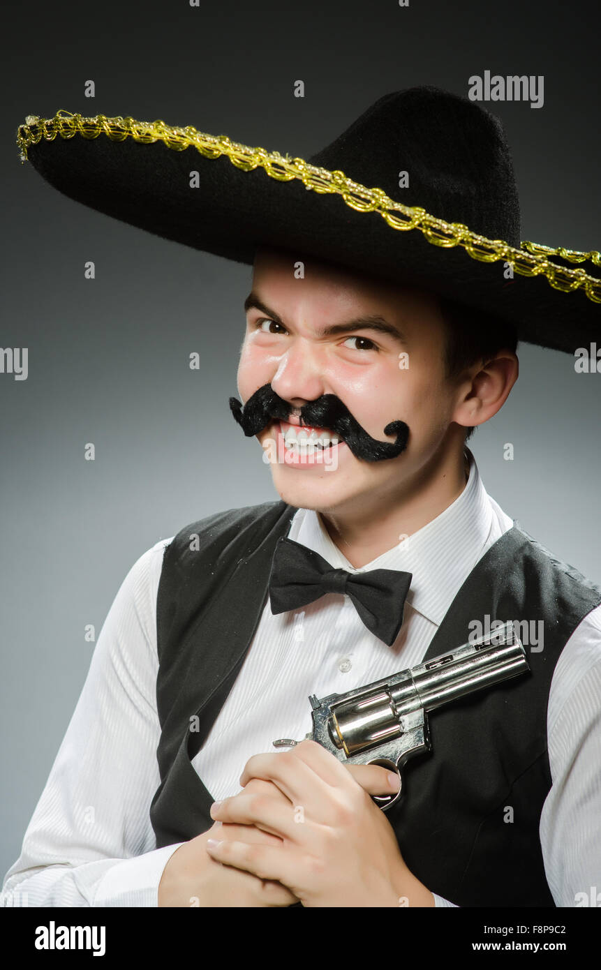 Smiling mexican with sombrero isolated on white Stock Photo - Alamy