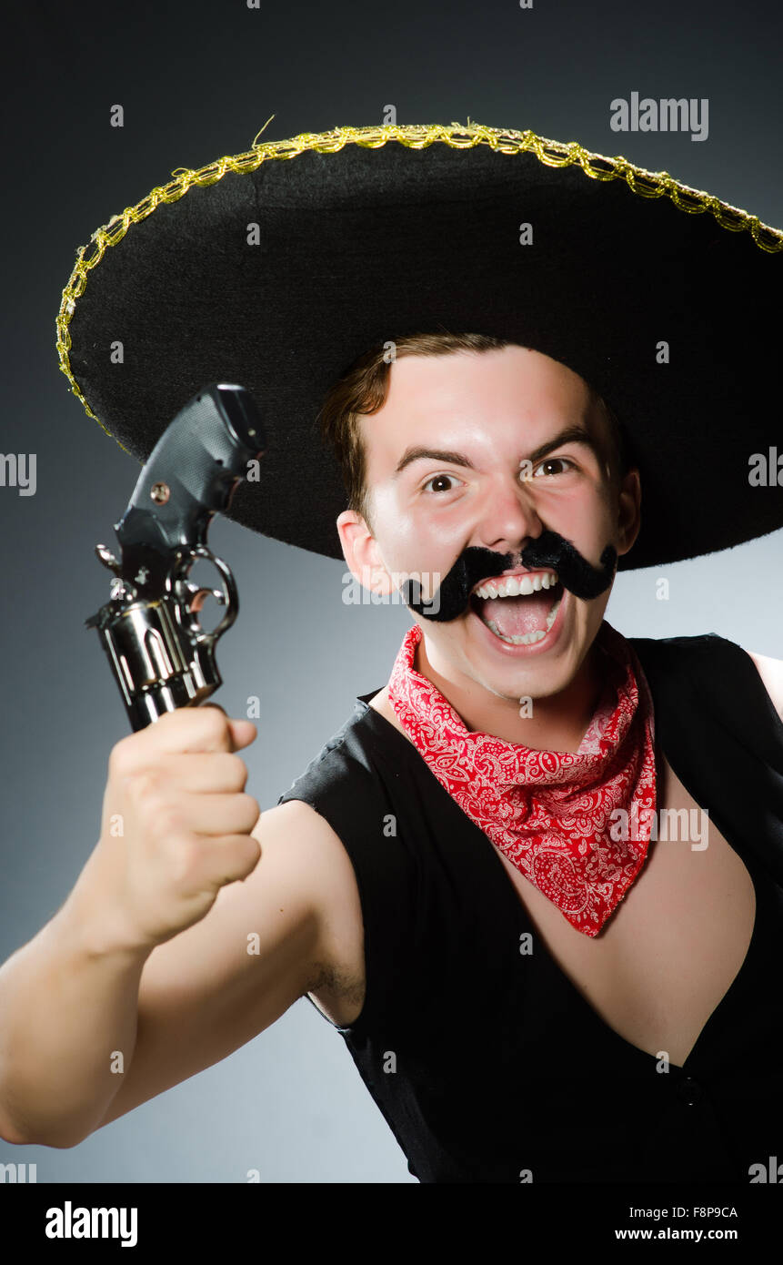 Smiling mexican with sombrero isolated on white Stock Photo - Alamy