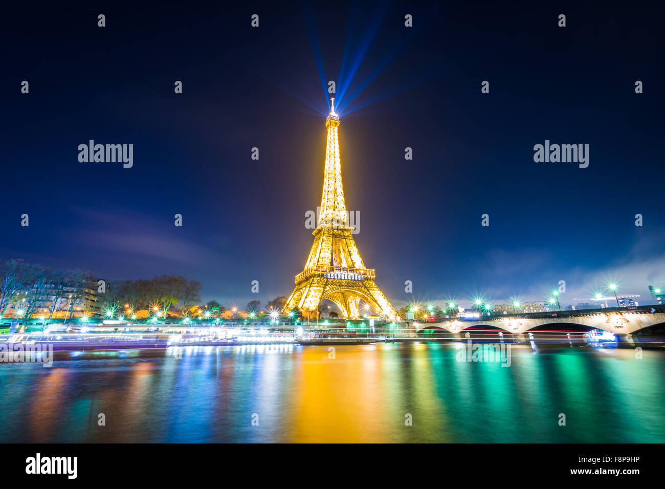 The Eiffel Tower and the Seine at night, in Paris, France Stock Photo ...