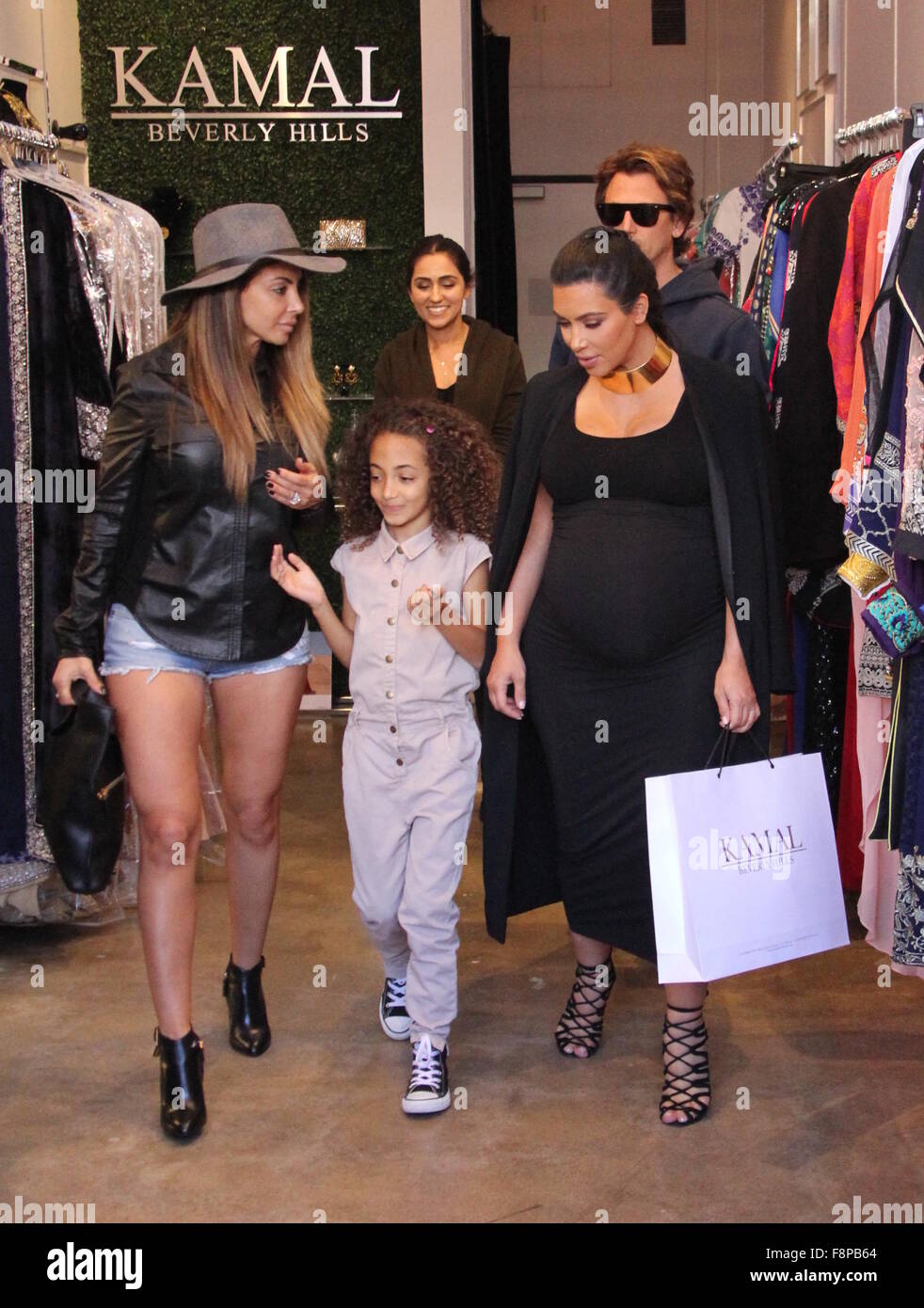 Heavily pregnant Kim Kardashian out shopping at Kamal with Jonathan ...