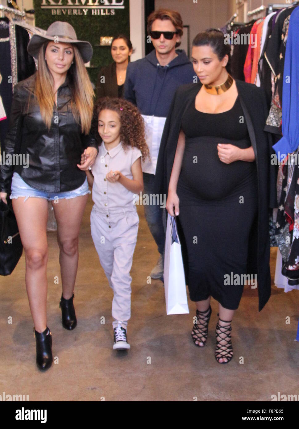 Heavily pregnant Kim Kardashian out shopping at Kamal with Jonathan ...