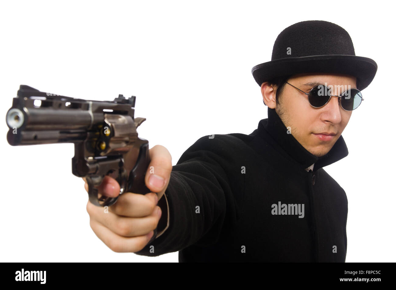 Young man with gun isolated on white Stock Photo - Alamy