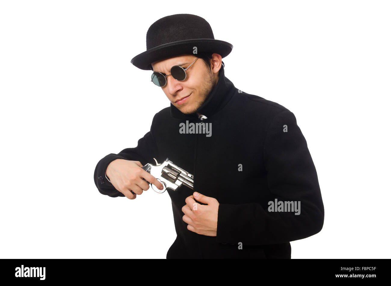 Young man with gun isolated on white Stock Photo - Alamy