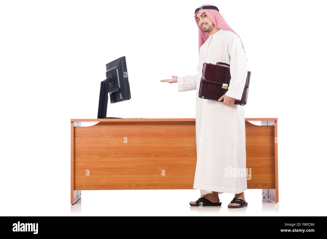 Arab man sitting at his desk Stock Photo - Alamy