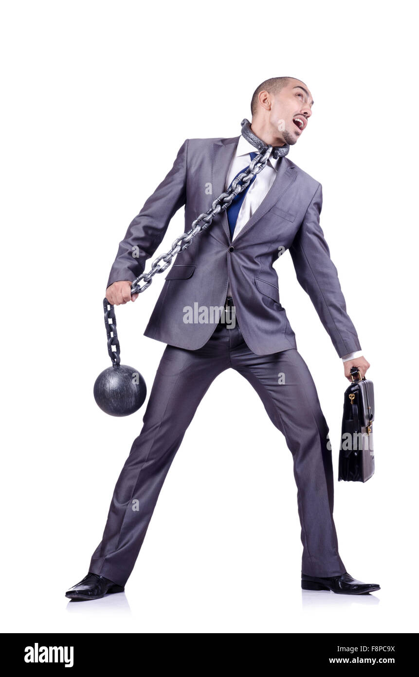 Businessman with shackles on white Stock Photo - Alamy