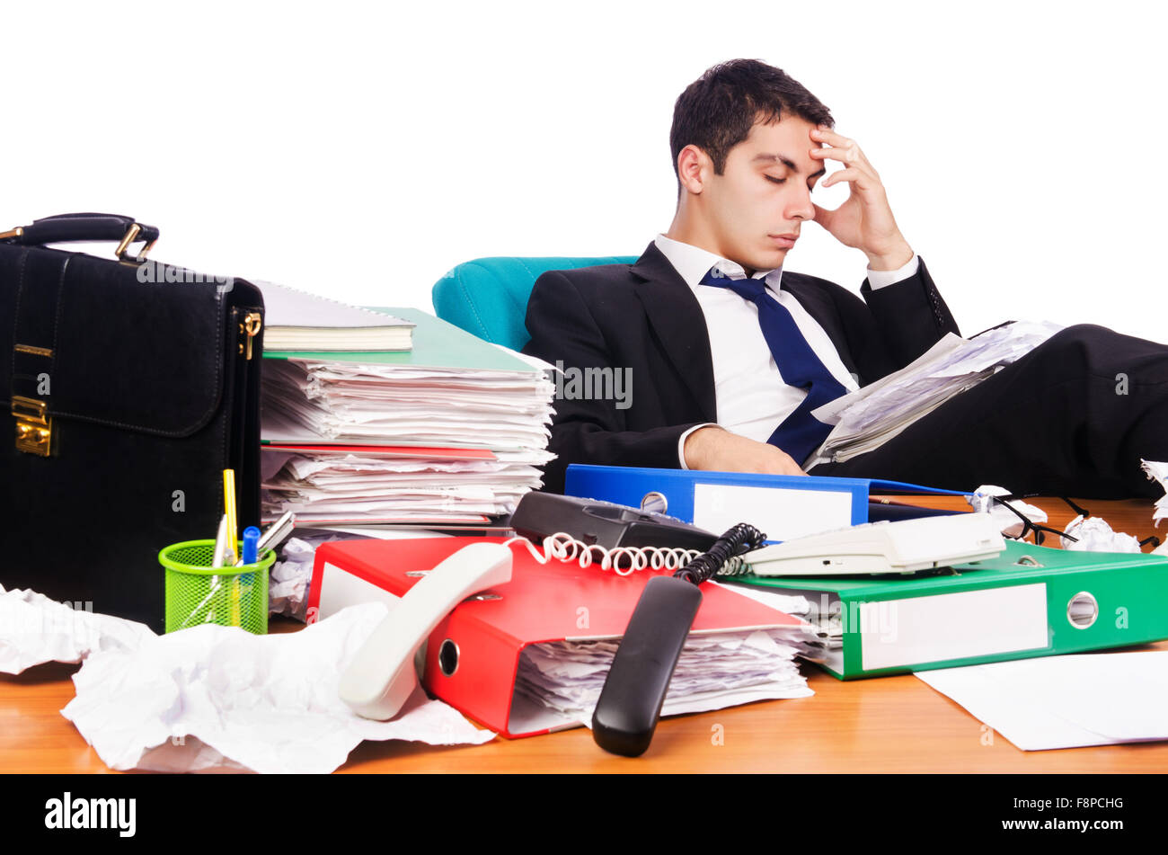 Young busy businessman at his desk Stock Photo - Alamy