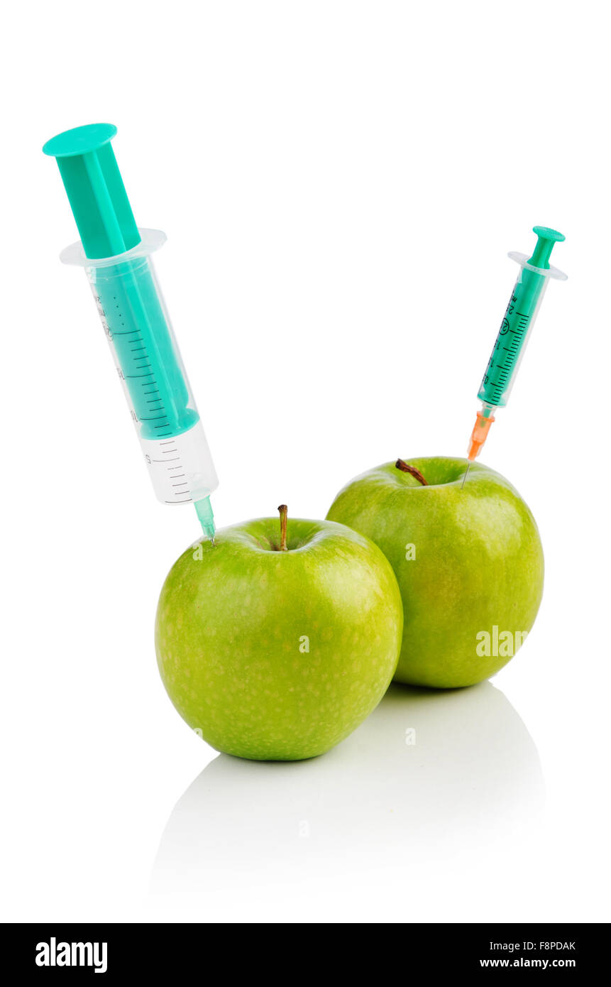 Experiment with apple and syringes Stock Photo - Alamy