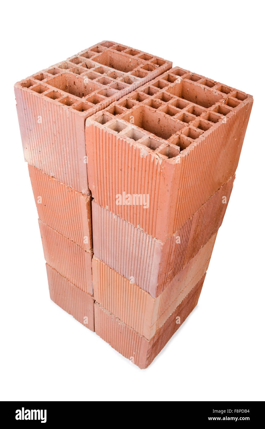 Stack of clay bricks isolated on white Stock Photo - Alamy