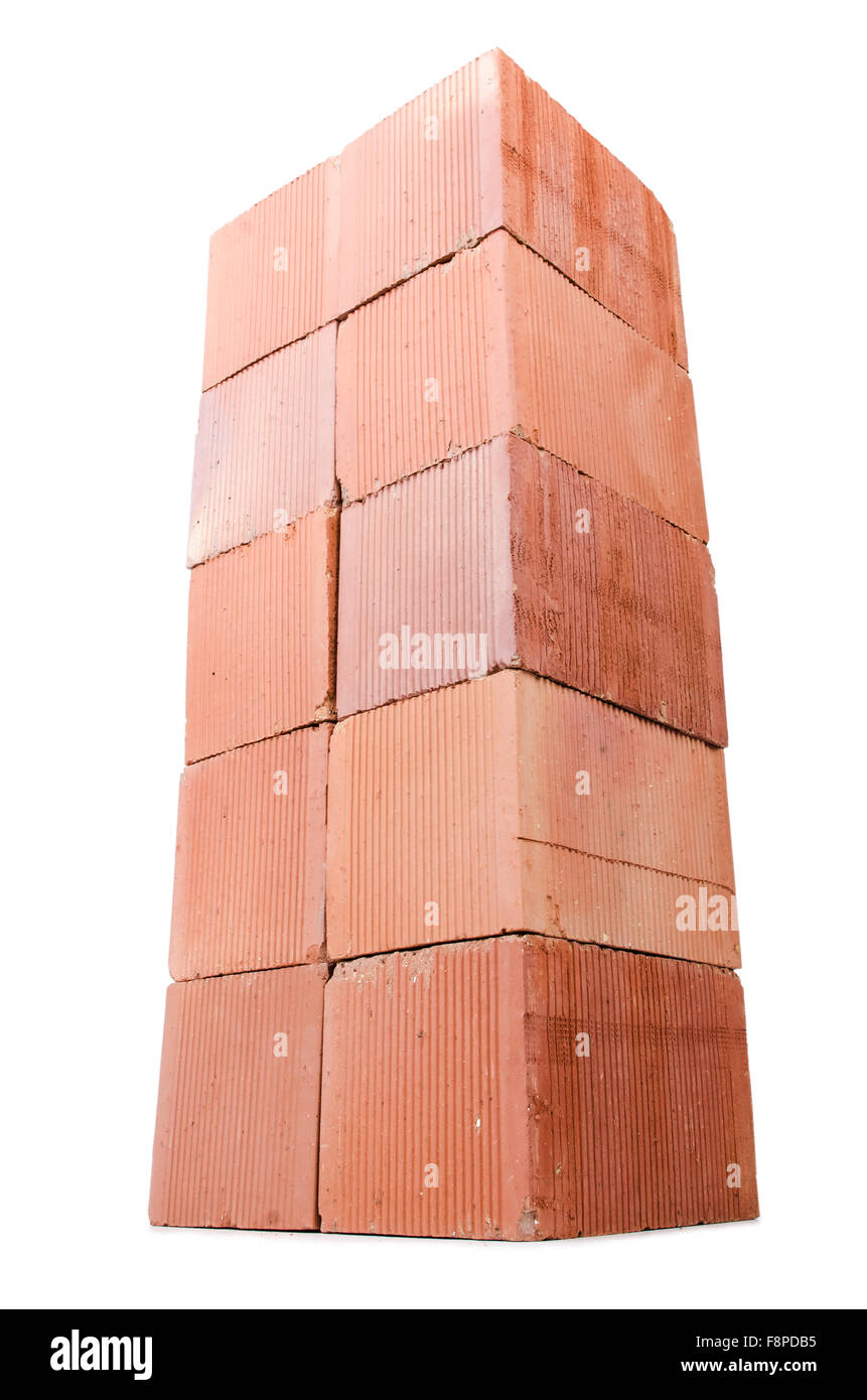 Stack of clay bricks isolated on white Stock Photo - Alamy