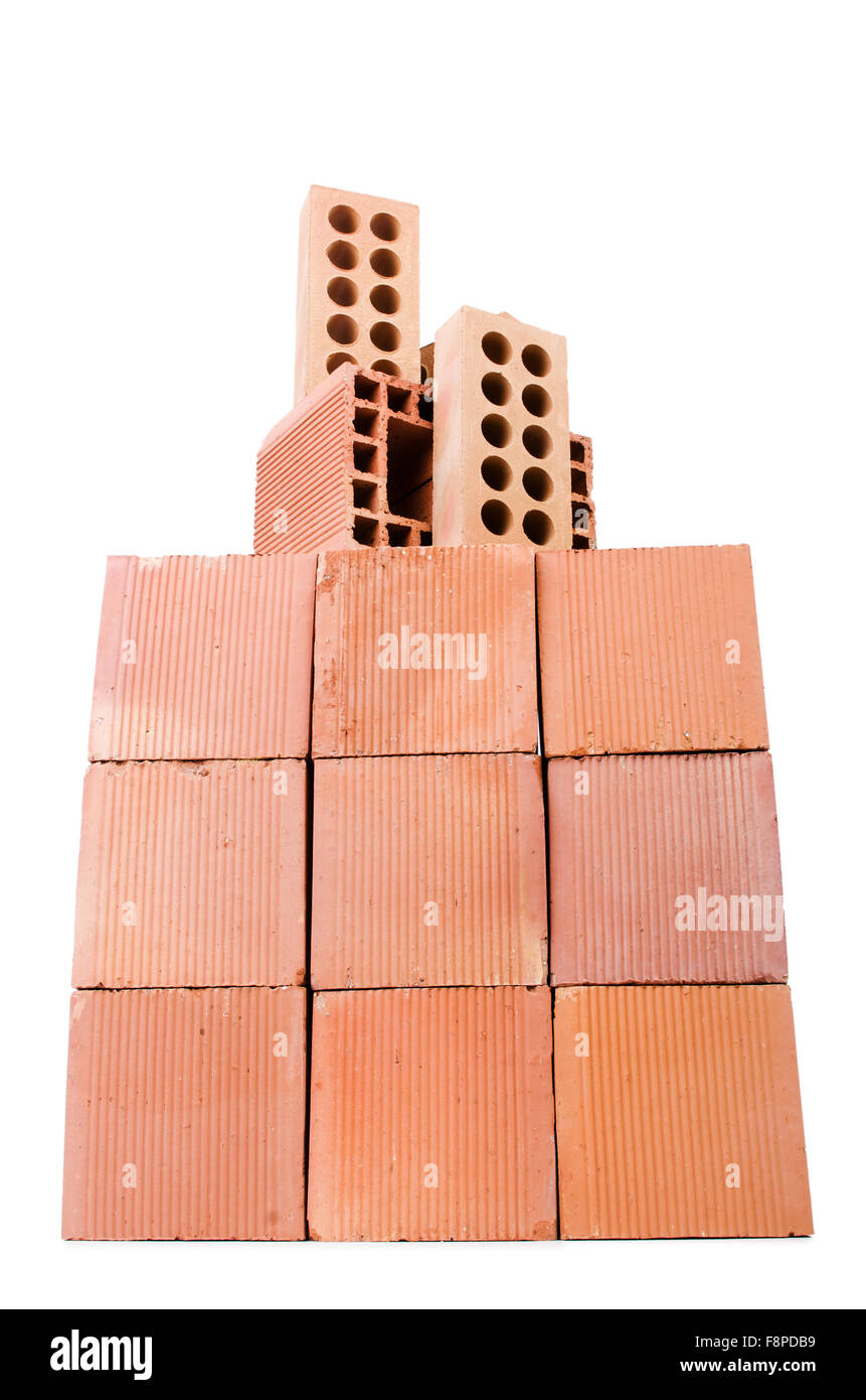 Stack of clay bricks isolated on white Stock Photo - Alamy