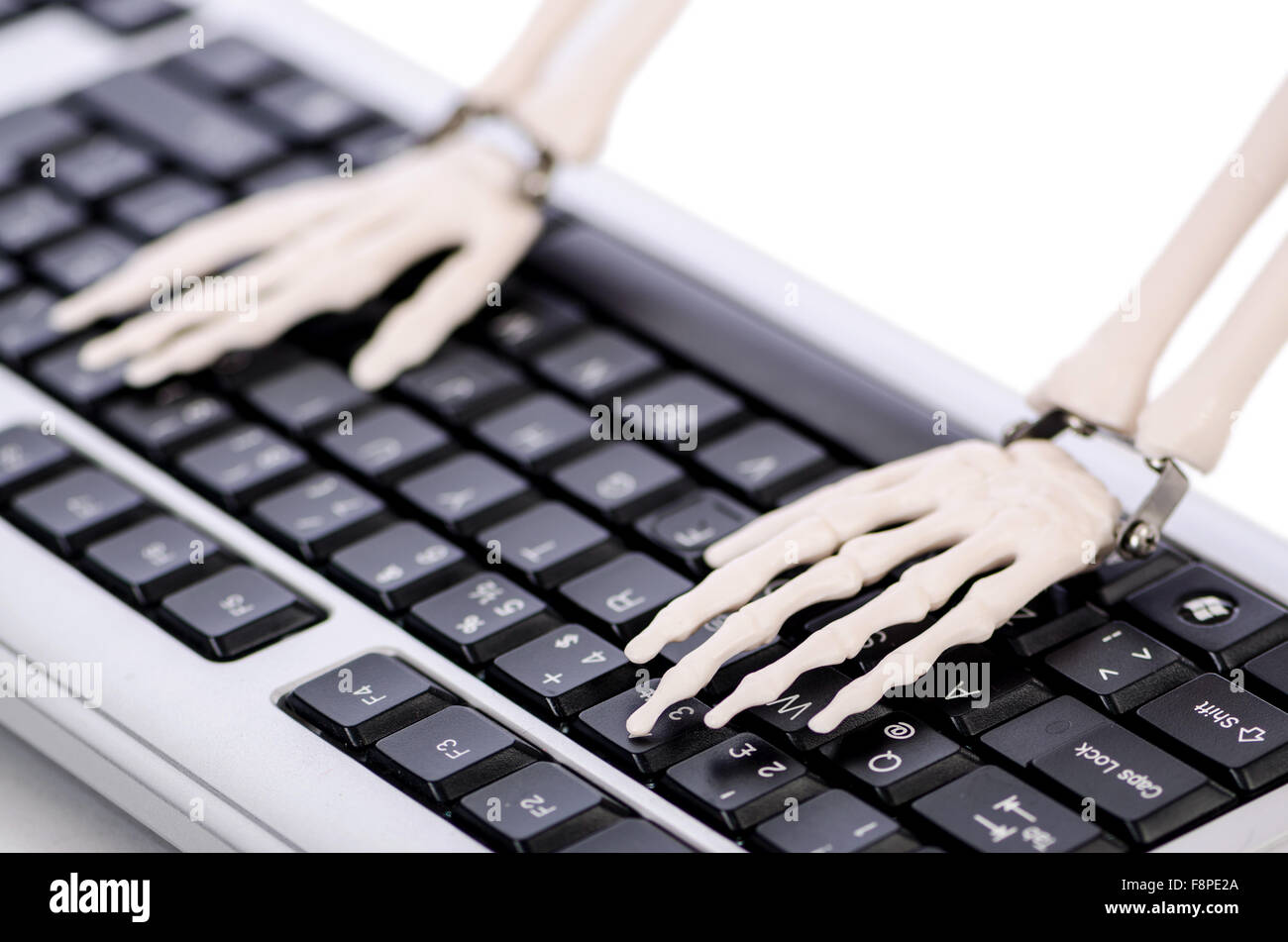 Skeleton Working On Laptop Stock Photos & Skeleton Working On Laptop ...
