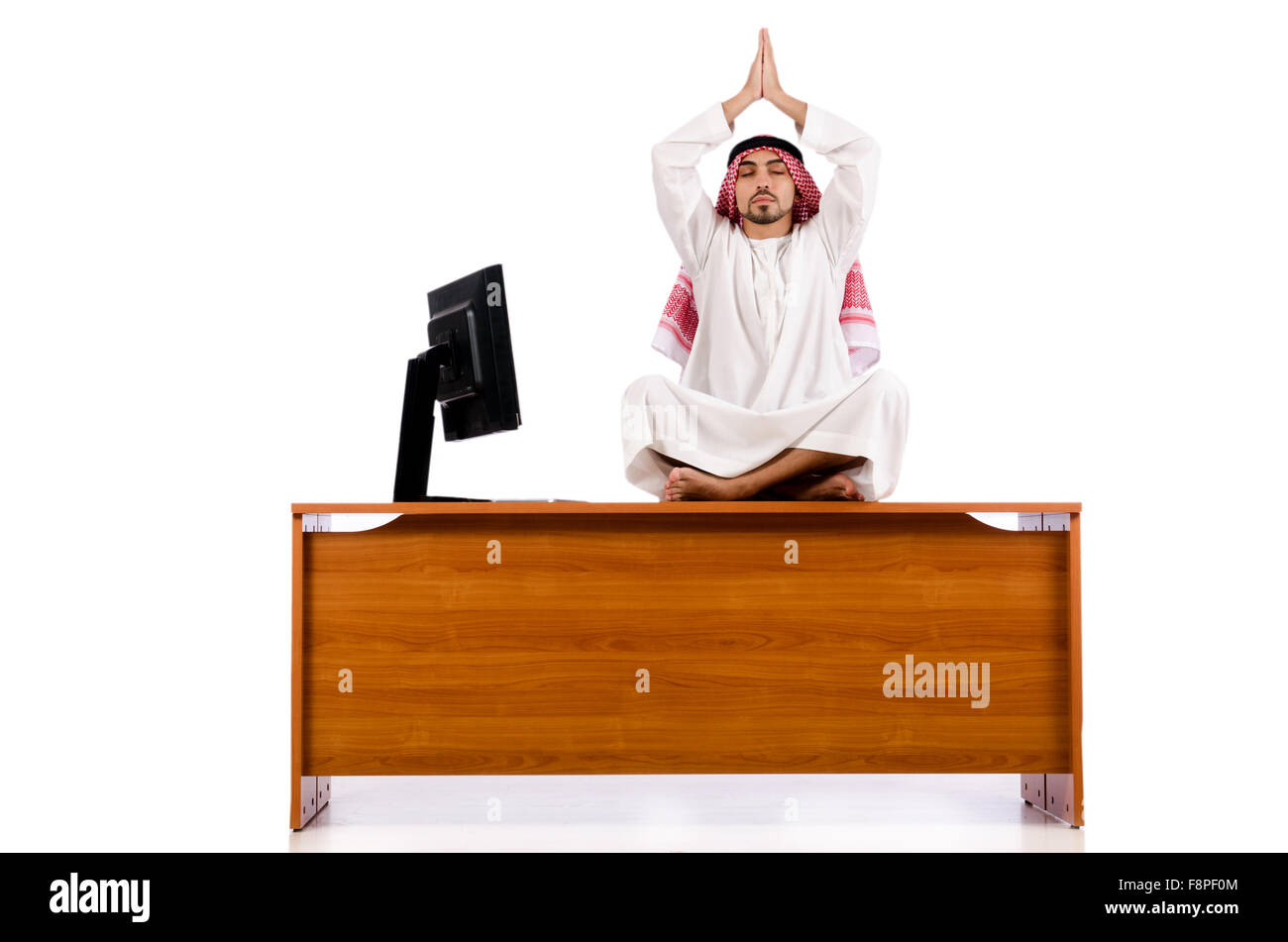 Arab man sitting at his desk Stock Photo - Alamy