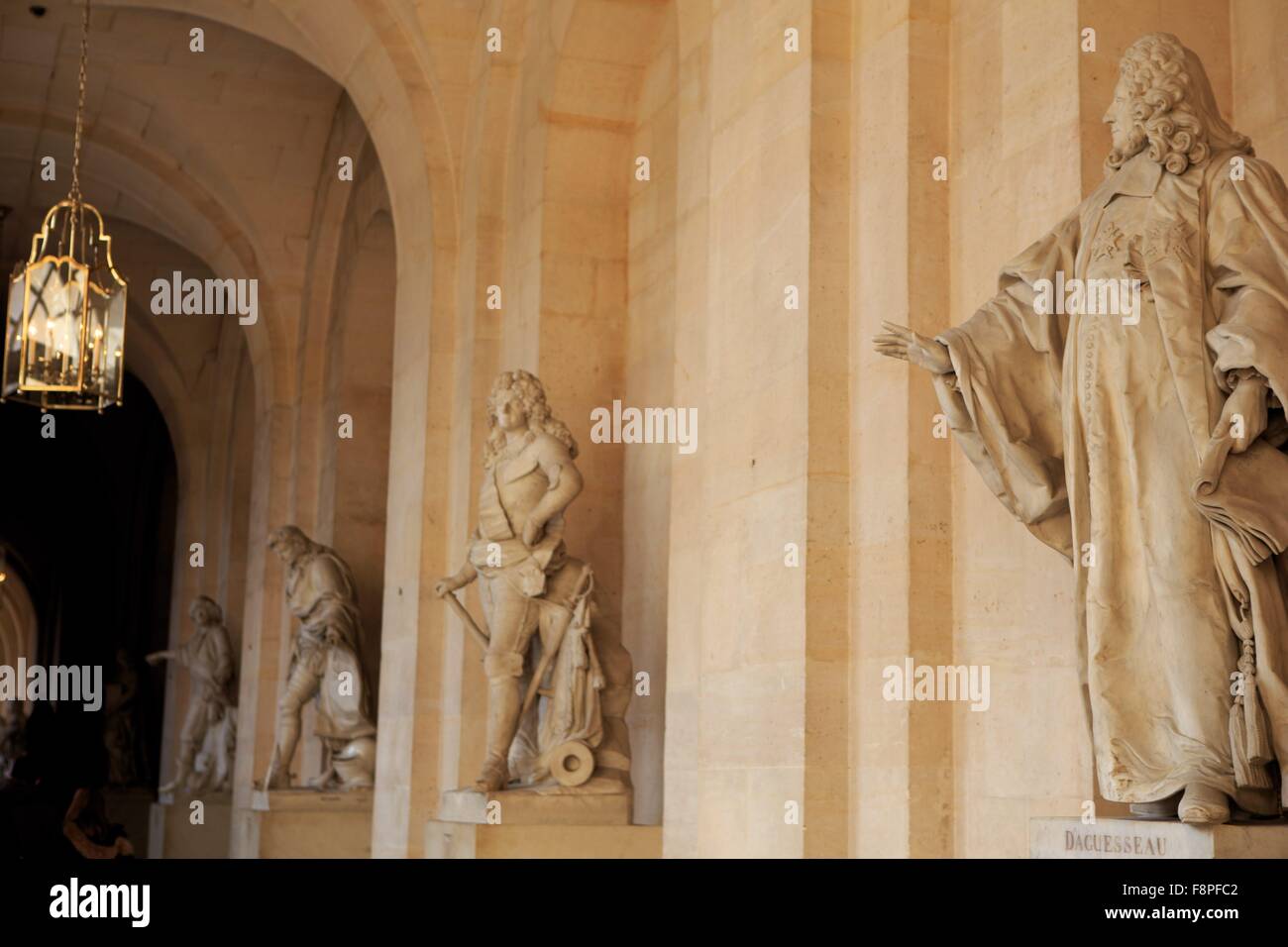 Various statues line the corridors of the Palace of Versailles, Paris ...