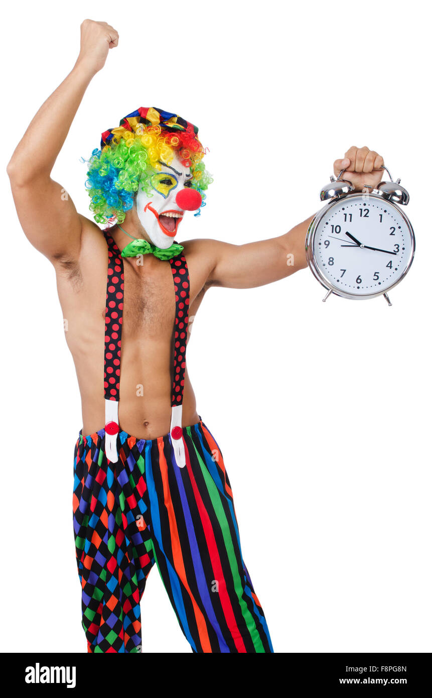 Clown with alarm clock on white Stock Photo - Alamy