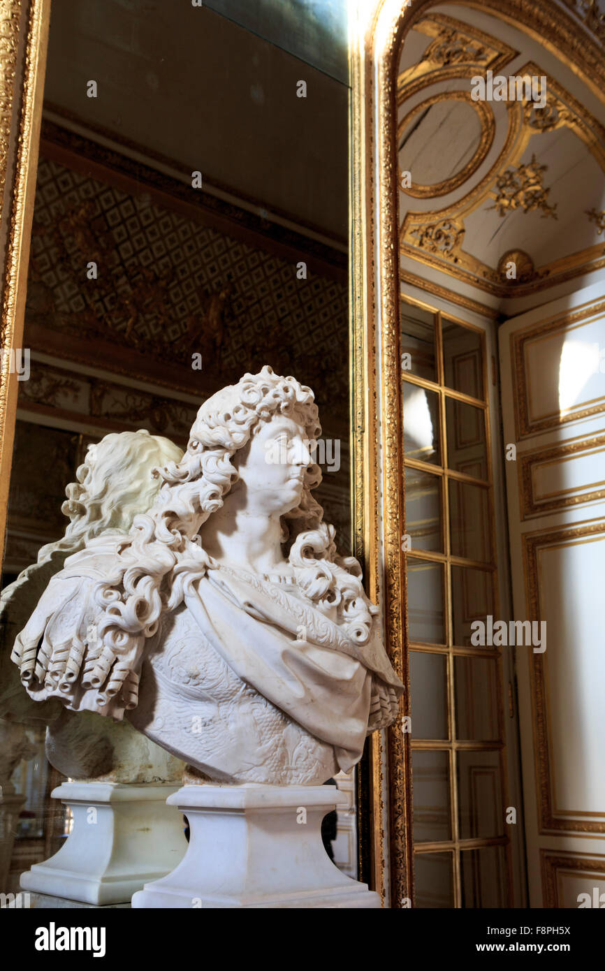 Various statues line the halls and rooms of the Palace of Versailles on ...