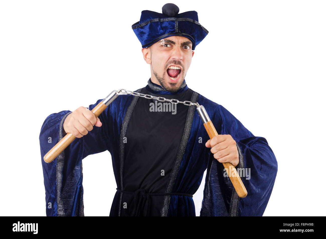 Martial arts master with nunchucks on white Stock Photo - Alamy