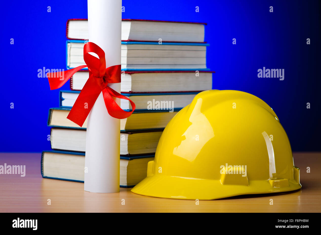 Concept of industrial education with hard hat Stock Photo - Alamy