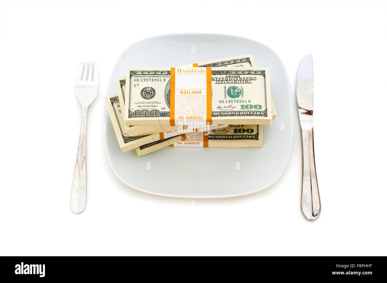 Financial concept - eating money isolated on white Stock Photo - Alamy