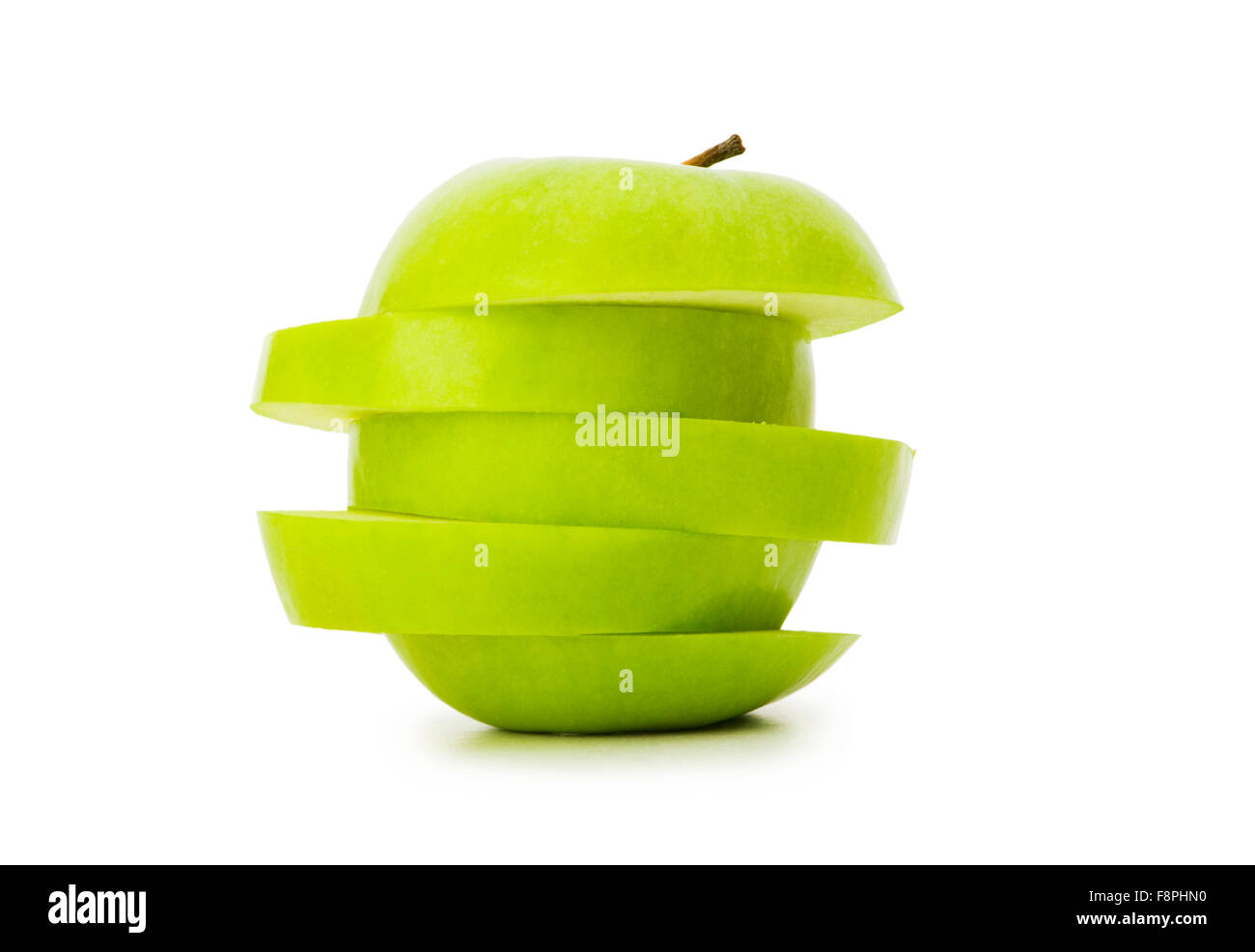 Sliced green apple isolated on white Stock Photo - Alamy