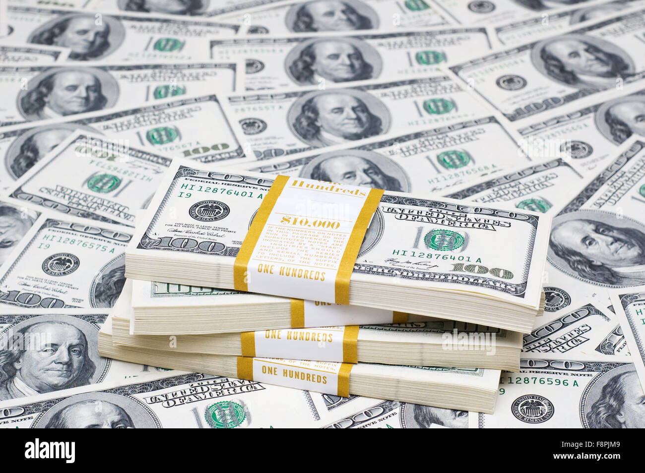 Stack of dollars on money background Stock Photo - Alamy