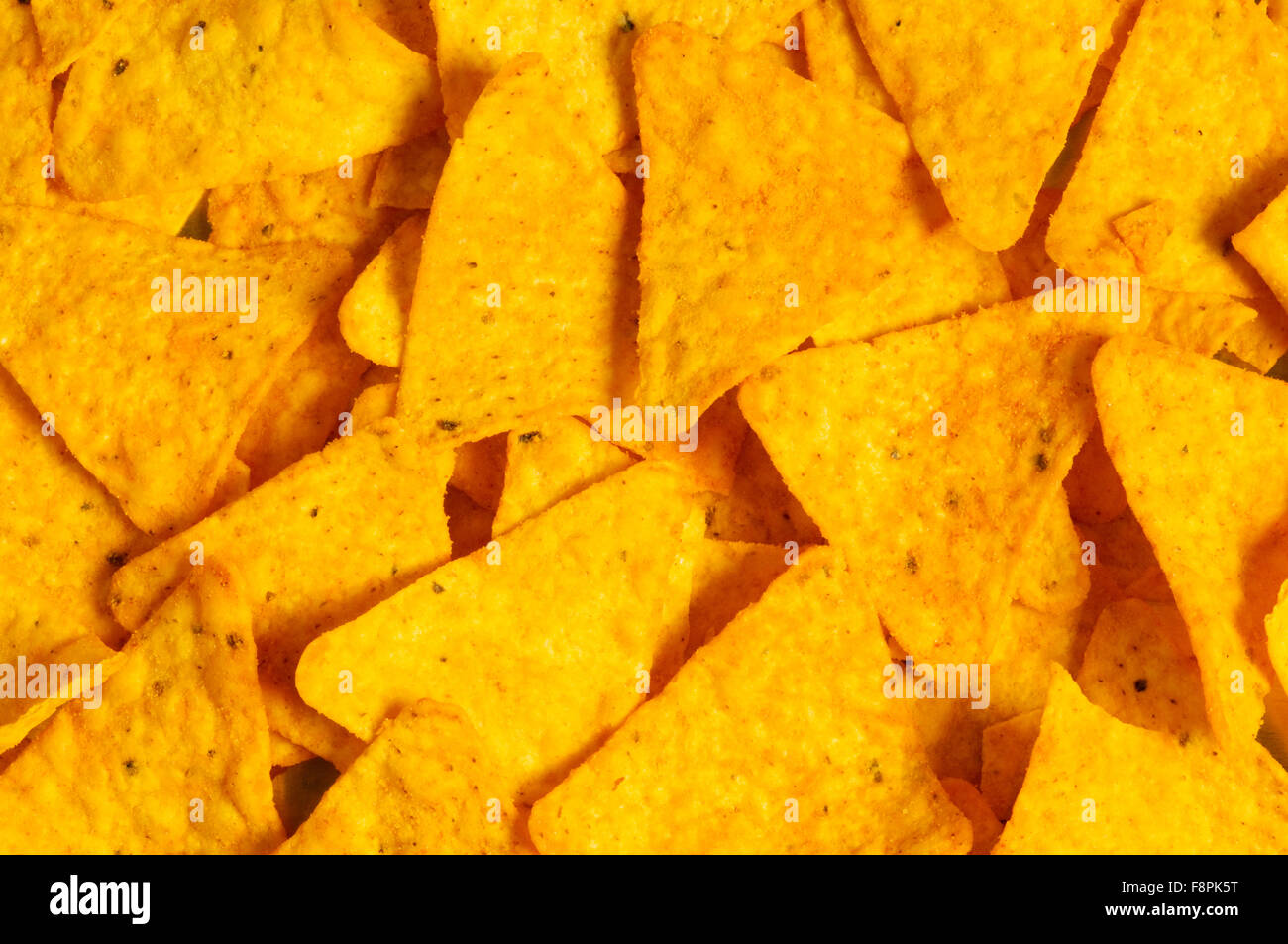 Heap of chips arranged on background Stock Photo - Alamy