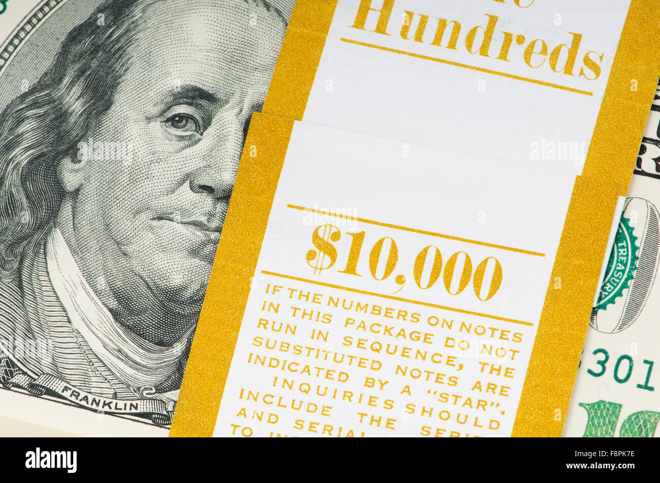 Stack of dollars isolated on the white Stock Photo - Alamy