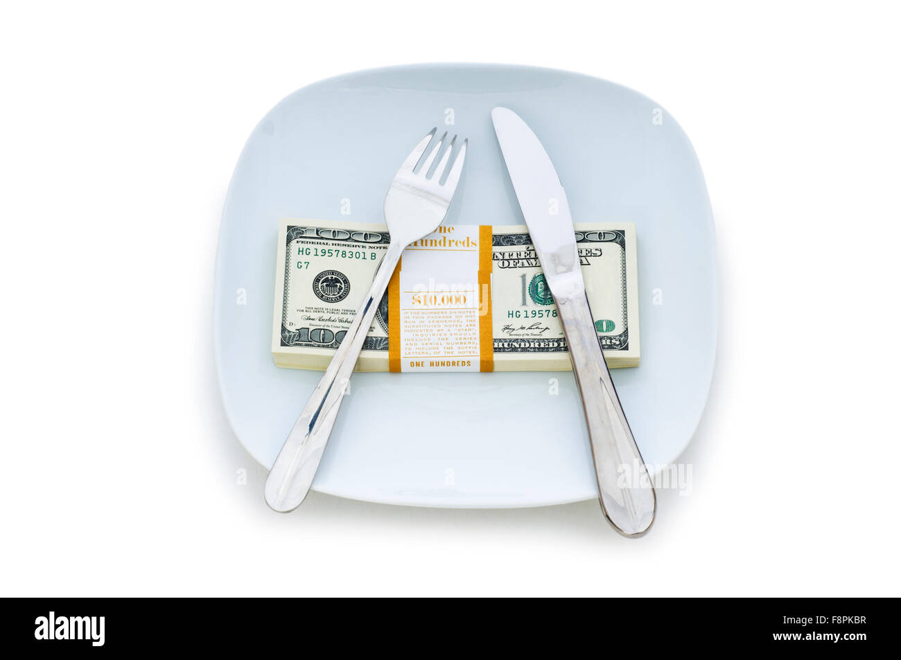 Financial concept - eating money isolated on white Stock Photo - Alamy