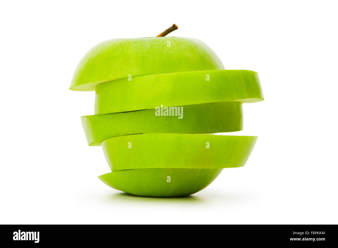 Sliced green apple isolated on white Stock Photo - Alamy