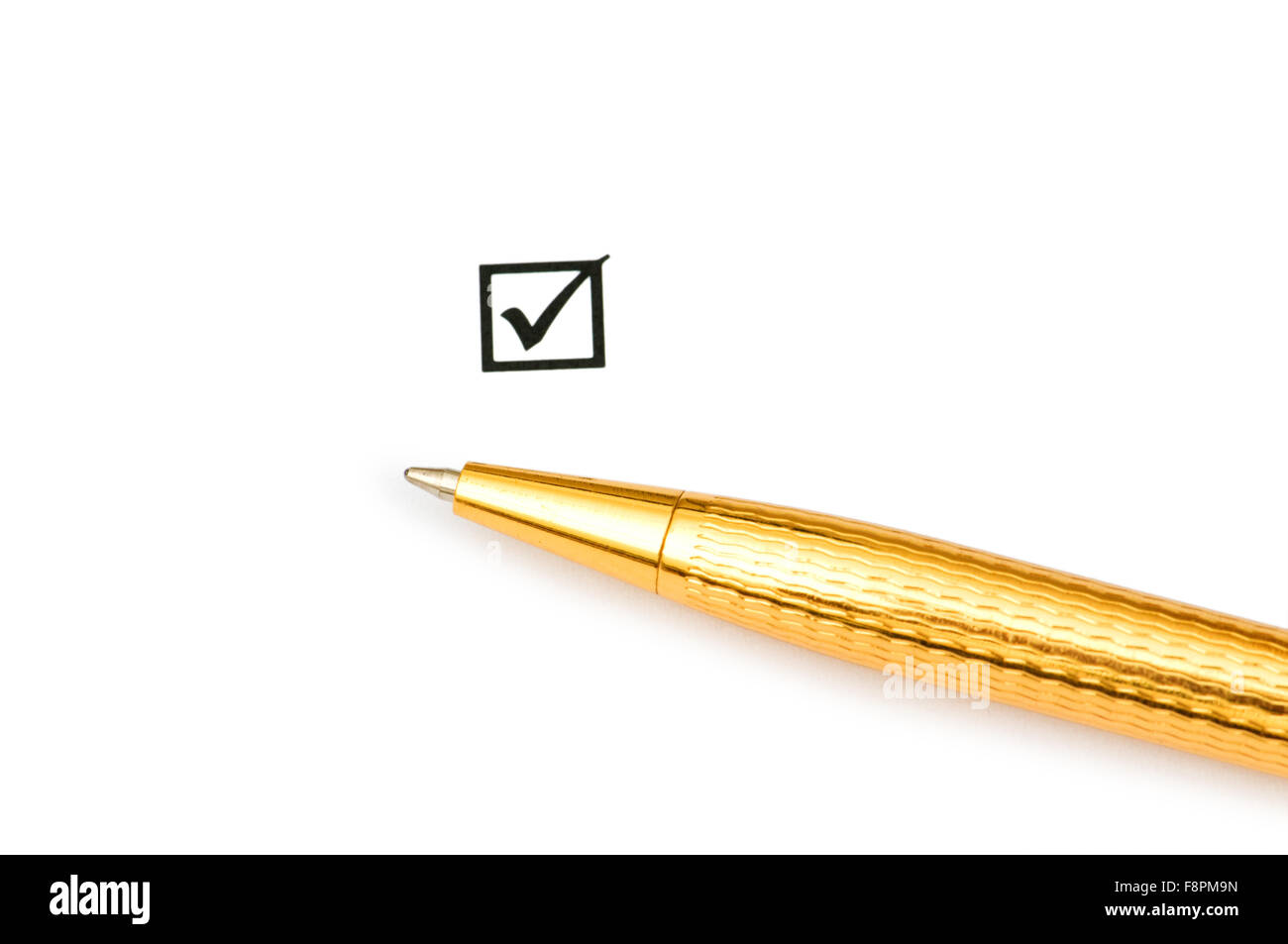 Tick in the box and golden pen Stock Photo - Alamy