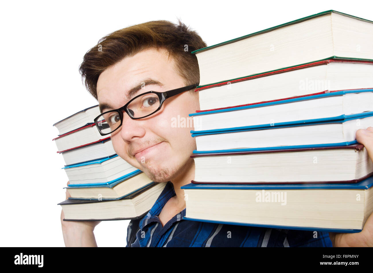 Funny student with stack of books Stock Photo - Alamy