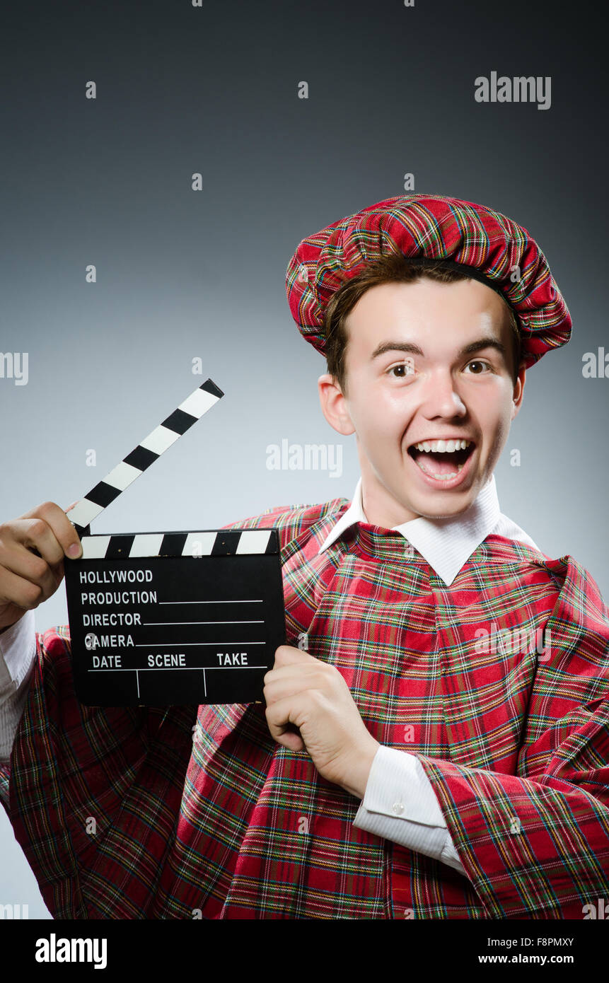 Funny scotsman with movie clapboard Stock Photo - Alamy