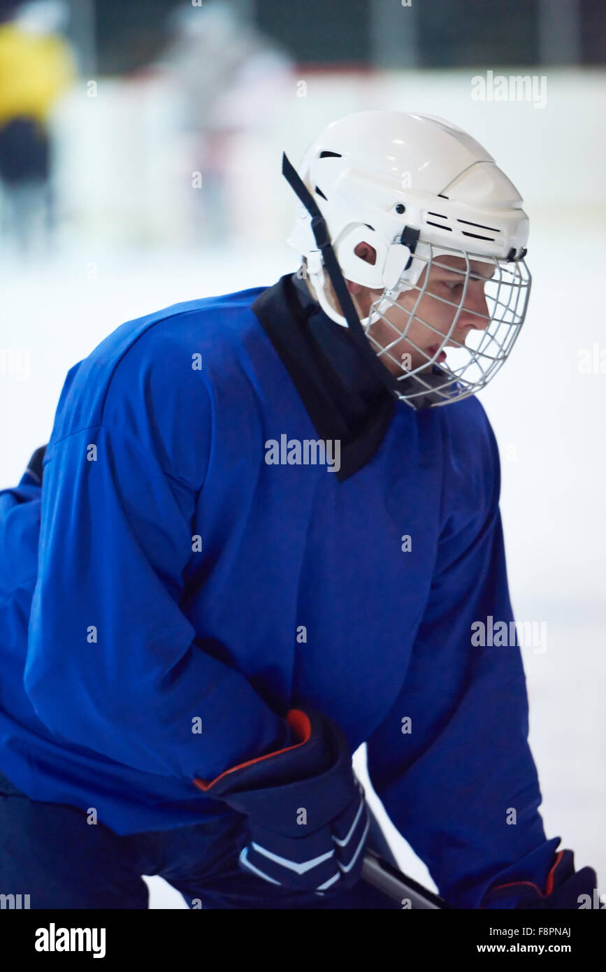 ice hockey player in action kicking with stick Stock Photo - Alamy