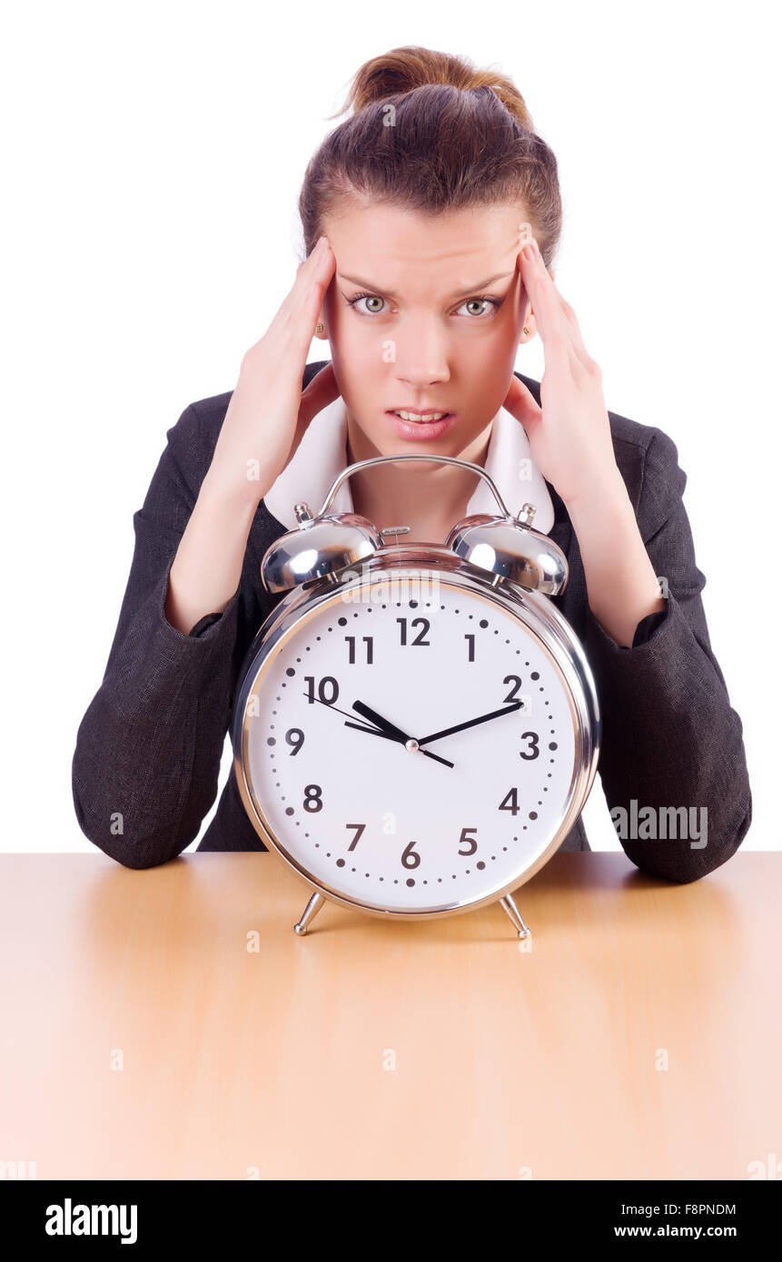 Businesswoman with clock missing her deadlines Stock Photo - Alamy