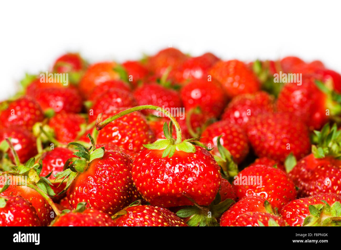 Red strawberries isolated on the white background Stock Photo - Alamy