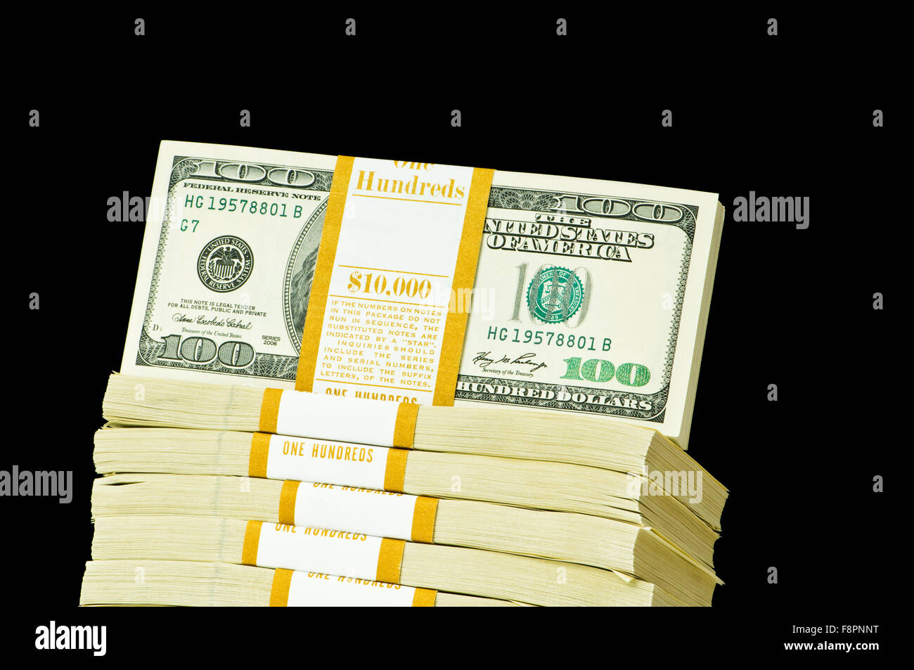 Stack of dollars isolated on the black Stock Photo - Alamy