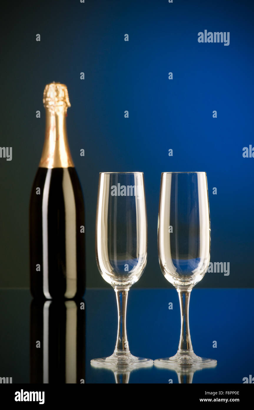 Champagne against color gradient background Stock Photo - Alamy